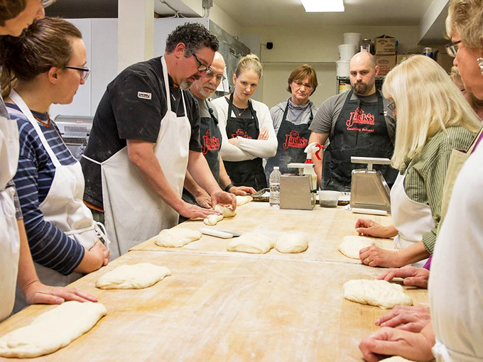 The sacred art of dough-making in action. This behind-the-scenes glimpse shows the careful attention that goes into every loaf before it reaches your table.