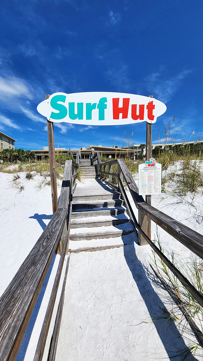 The stairway to seafood heaven comes with handrails and a view. This boardwalk entrance sets the stage for the coastal feast that awaits.