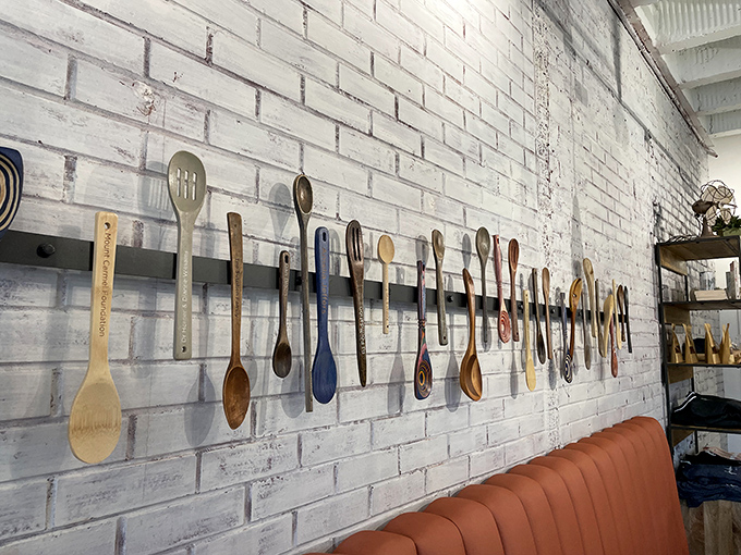 The wooden spoon wall isn't just décor—it's a testament to the universal language of cooking and the stories each utensil could tell if it could talk.