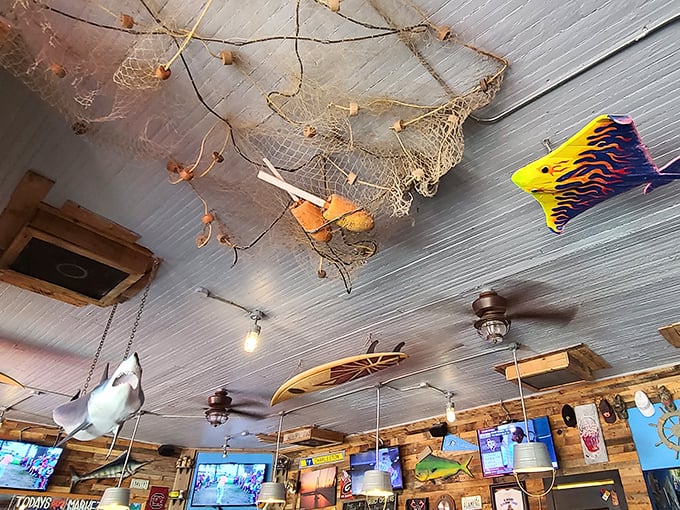 Fishing nets and colorful sea creatures adorn the ceiling &ndash; dining under the sea without getting wet.