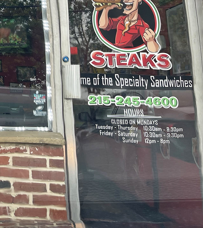 The hours posted like a treasure map&mdash;closed Mondays because even sandwich artisans need to rest their creative spirits.