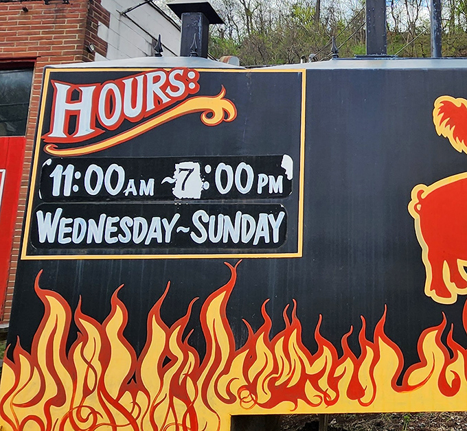 Hours of operation painted with flames—appropriate for a place that plays with fire. Wednesday through Sunday, 11-7, are the magic numbers for your barbecue pilgrimage.