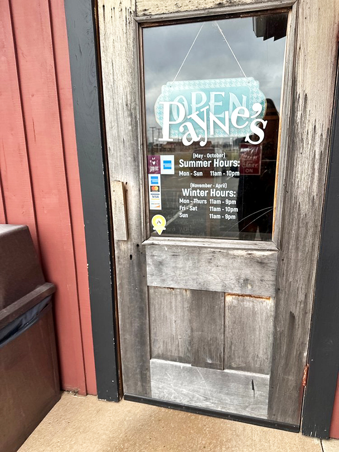 The door tells the story &ndash; Payne's adjusts its hours with the seasons, just like any sensible Midwestern establishment with British sensibilities.