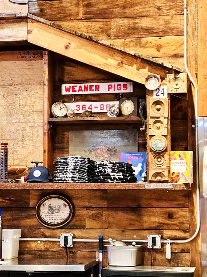 Even the d&eacute;cor tells a story&mdash;rustic wood, vintage signs, and what appears to be a "Weaner Pigs" sign. Portland's quirky soul in restaurant form.