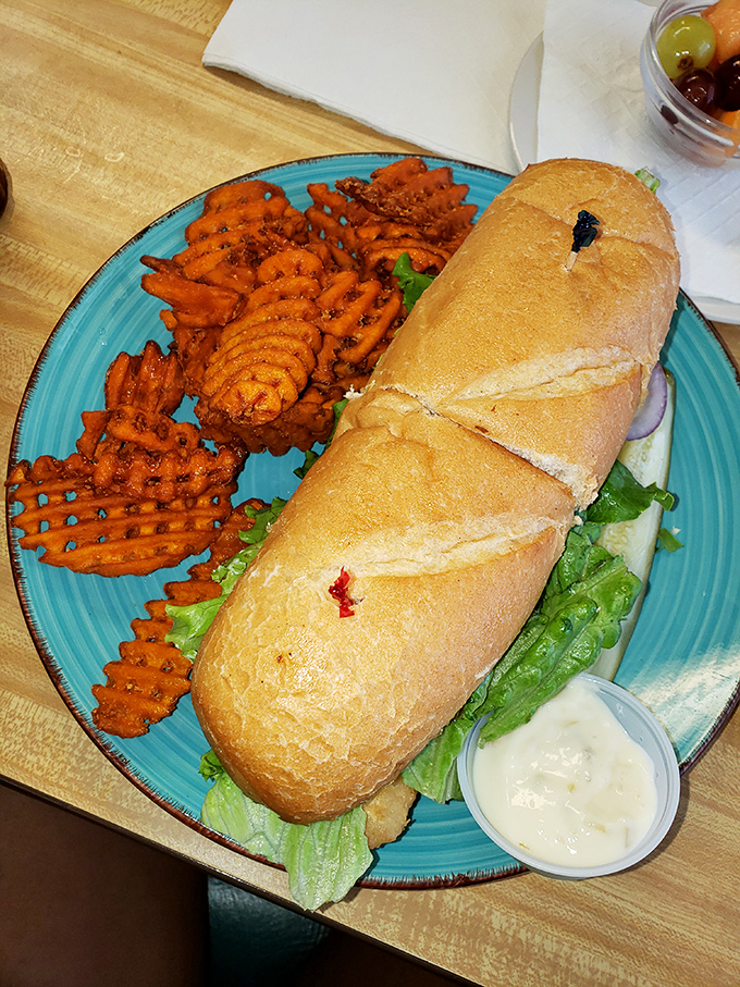 This sub isn't just a sandwich&mdash;it's a commitment. Served with waffle fries on that signature turquoise plate, it's a lunchtime showstopper.