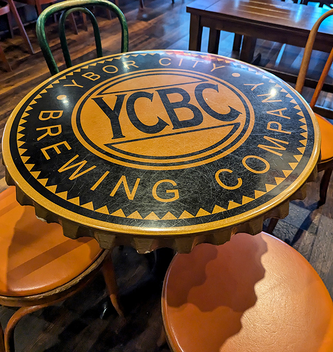 Even the tables celebrate beer culture here. This bottle-cap design isn't just Instagram-worthy&mdash;it's a reminder of the craftsmanship in every sip.