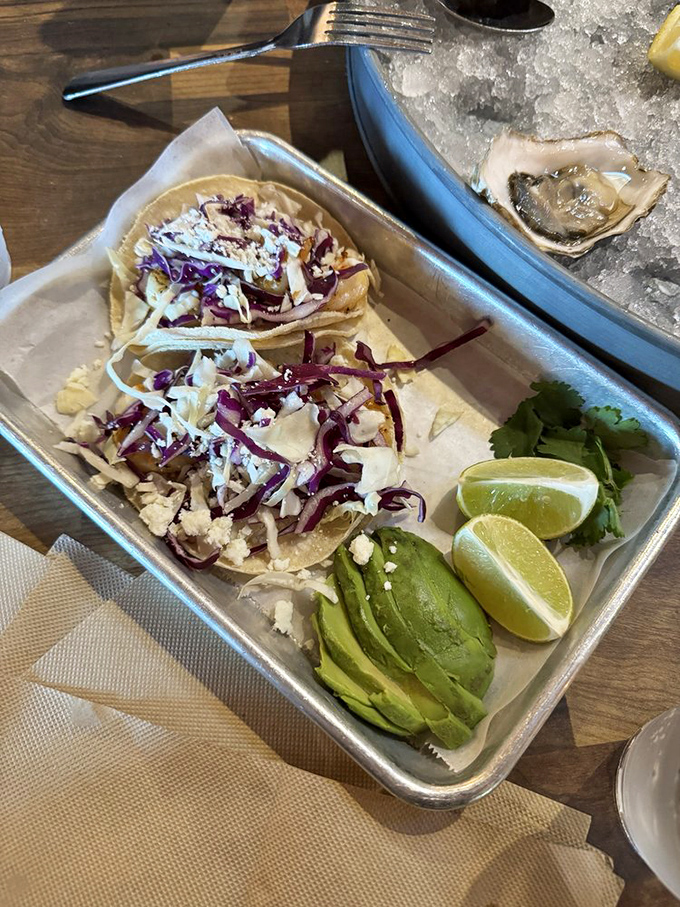 Tacos that bring the sea to corn tortillas, topped with crunchy slaw and served with California's other green gold&mdash;perfectly ripe avocado.