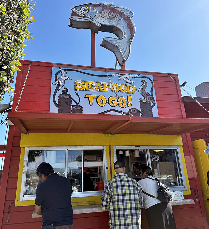 The take-out window serves those who can't wait to devour their seafood treasures with a view of the waves.