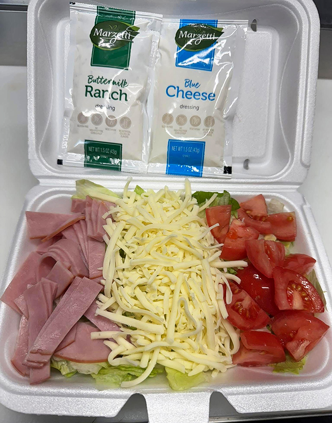 Even in to-go form, the attention to detail shines through&mdash;ham, cheese, and tomatoes arranged with care, not haste.
