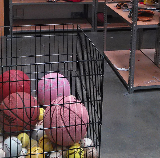 Sports equipment purgatory: where barely-used basketballs and baseballs wait for their second chance at backyard fame and neighborhood glory.