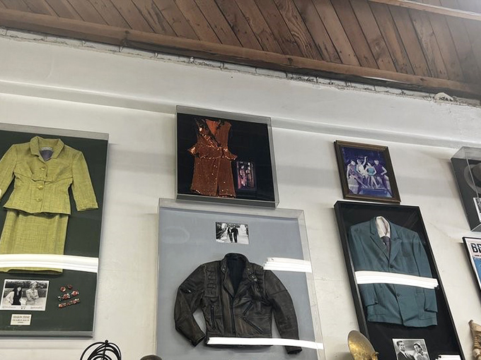 The wall of fame displays particularly notable costume pieces in shadow boxes, complete with production stills&mdash;museum-worthy memorabilia at thrift store prices.