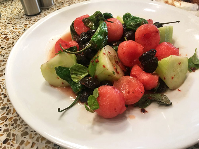 A watermelon salad that's summer on a plate&mdash;bright, refreshing, and the perfect counterpoint to all that glorious fried goodness.