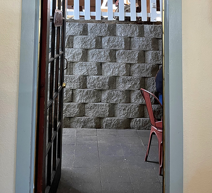 This passageway doesn't just lead to a patio&mdash;it's a portal to the outdoor breakfast dimension where fresh air enhances maple syrup by 27%.