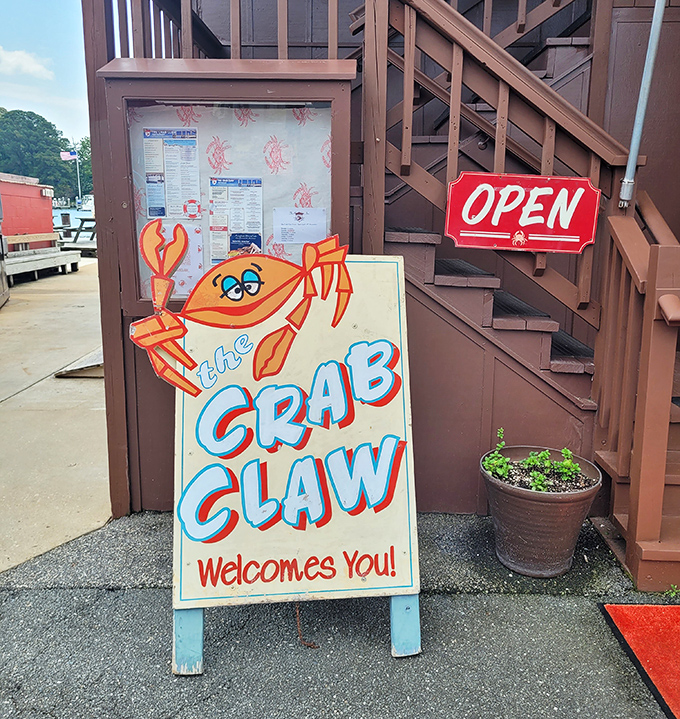 The cartoon crab on the welcome sign has been greeting hungry visitors for decades, his cheerful expression promising seafood salvation ahead.