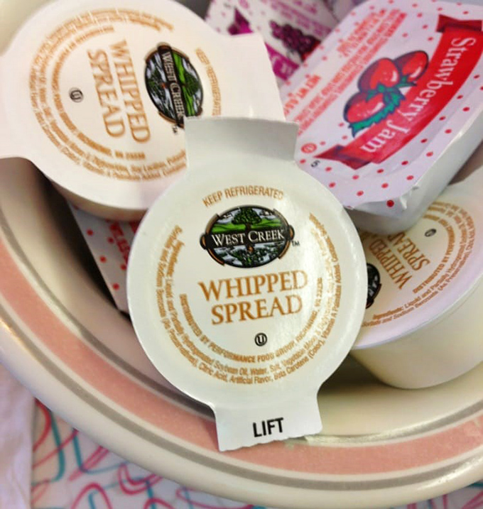 The humble heroes of breakfast&mdash;little cups of whipped spread waiting for their moment to shine on warm toast or pancakes.