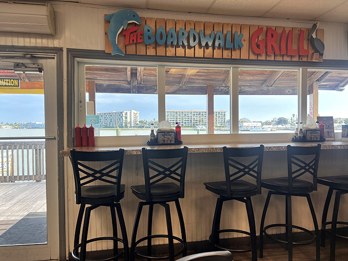 Counter seating with a water view&mdash;nature's television for those who prefer pelican drama to daytime soaps. 