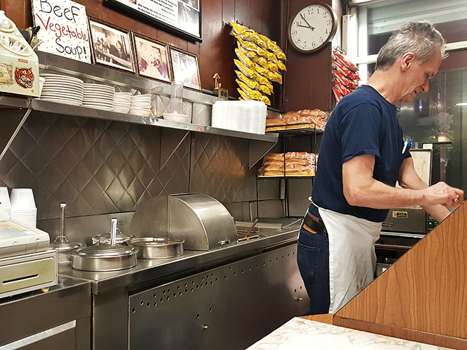 Behind the scenes magic where short-order wizardry happens. Notice the handwritten soup sign&mdash;no algorithm recommended that beef vegetable.