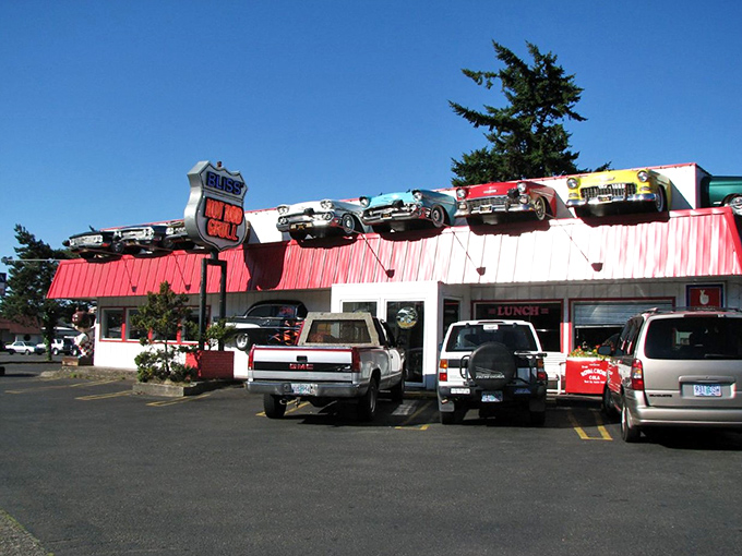 Quirky Elmer's Restaurant in Florence, where vintage cars on the roof announce "we don't take ourselves too seriously here!
