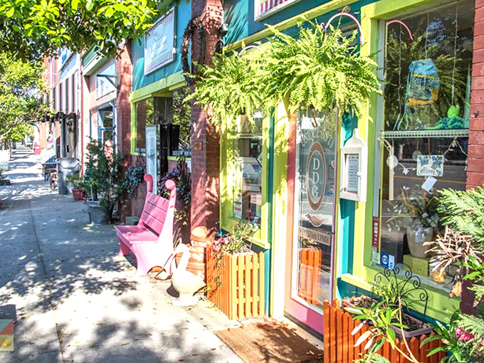 Colorful storefronts welcome visitors to a coastal town where rushing is strongly discouraged.