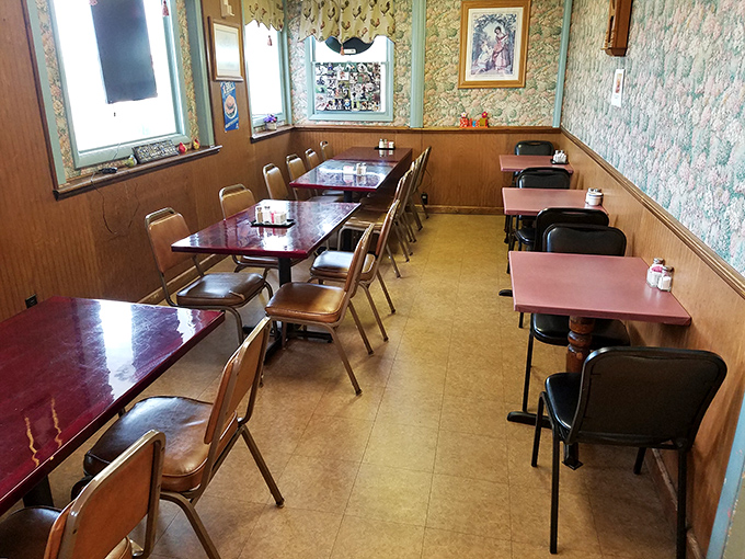 The dining room's no-nonsense setup tells you everything: this place prioritizes good food and conversation over trendy interior design any day.