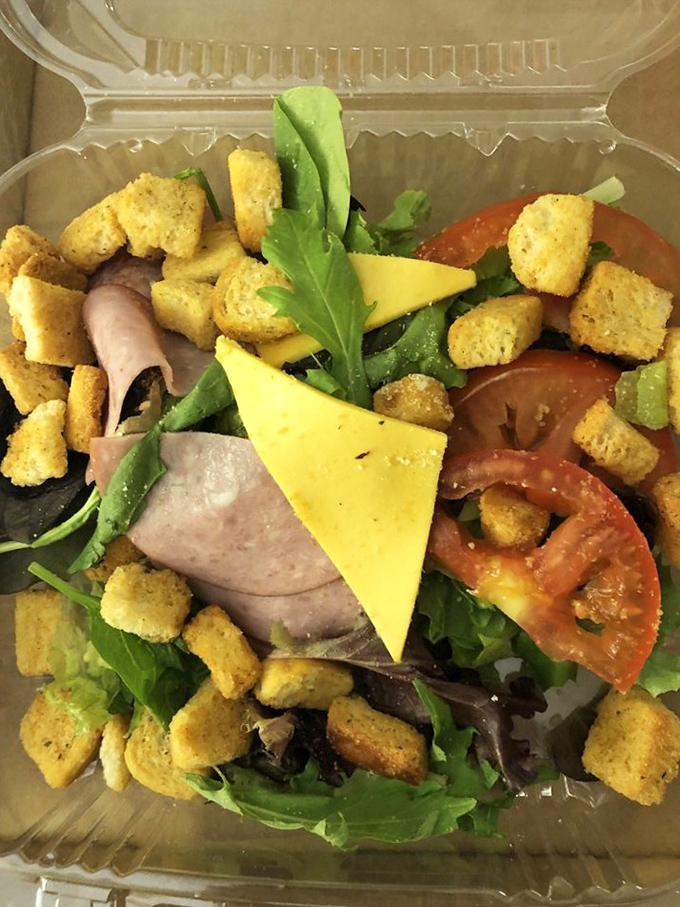 A salad that doesn't apologize for being delicious. Fresh greens, quality cold cuts, and golden croutons prove healthy options needn't be boring.