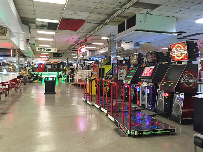 The arcade section: where quarters disappear faster than your diet resolutions at a donut shop. Blinking lights beckon gamers young and old.