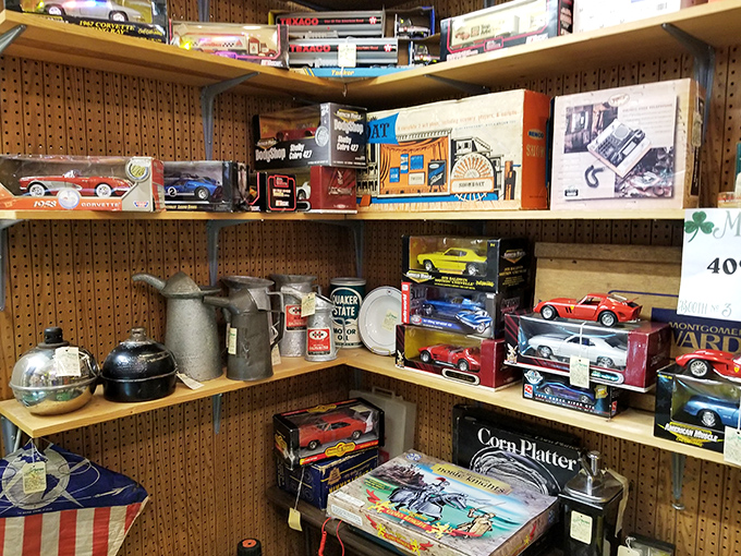Man cave memorabilia corner where vintage toy cars and nostalgic advertising meet. Guaranteed to trigger at least three "I had that!" exclamations.