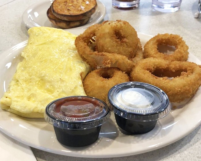 Omelet artistry that makes you wonder if the chef has a side hustle in architecture &ndash; perfectly folded and generously stuffed. 