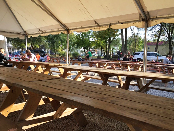 Picnic tables waiting for the barbecue faithful &ndash; where strangers become friends over shared sauce and smoked meat philosophies.