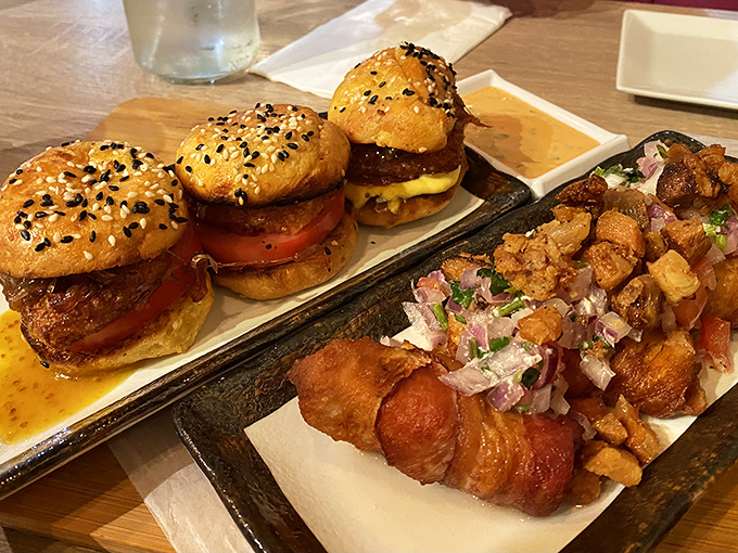 Bacon-wrapped tamales alongside perfect sliders&mdash;proof that sometimes the best approach to dining is simply saying "yes" to everything.