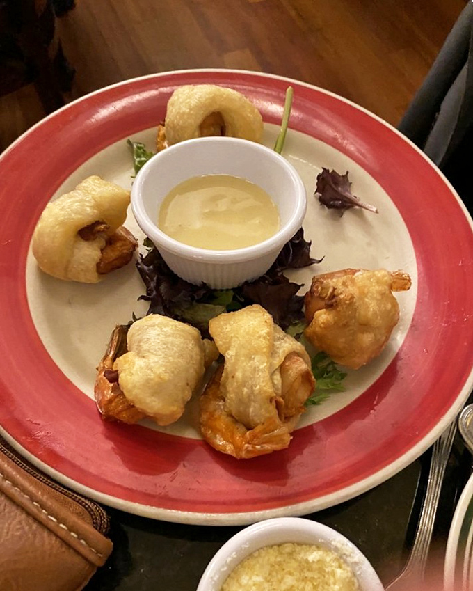 Tempura shrimp that crunch like autumn leaves, but taste infinitely better. That dipping sauce is liquid gold.