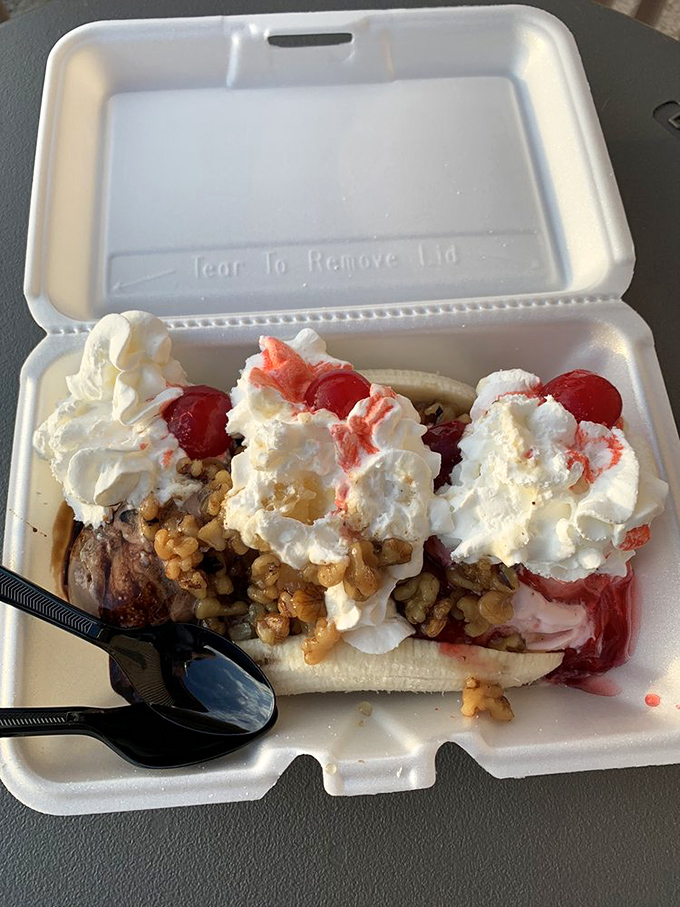 The banana split: nature's perfect fruit transformed into a vessel for ice cream, whipped cream, and absolutely zero regrets.