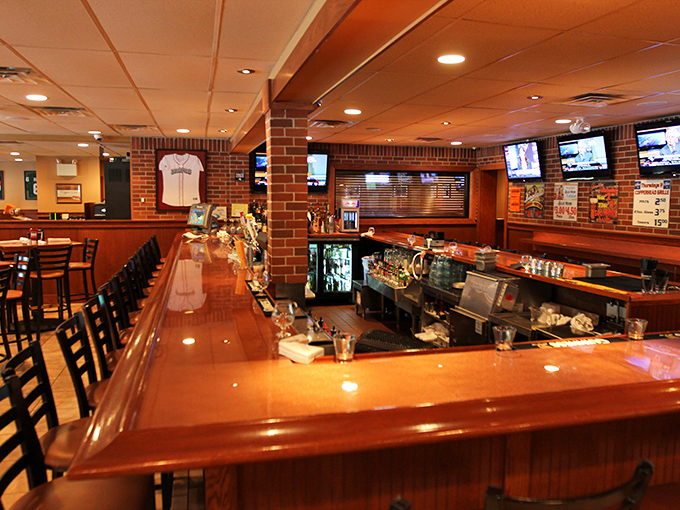 A gleaming bar top that's witnessed countless celebrations, commiserations, and conversations &ndash; the heart of any good sports grill.