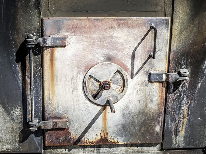 The sacred vault where magic happens&mdash;this smoke-seasoned door has seen more perfect briskets than most people will in a lifetime.