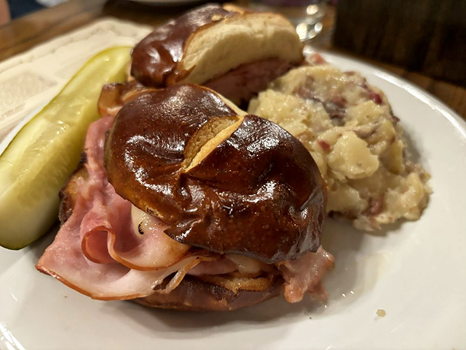 The Bavarian Ham and Cheese sandwich—where pretzel bun meets meat in a union so perfect it deserves its own wedding march.