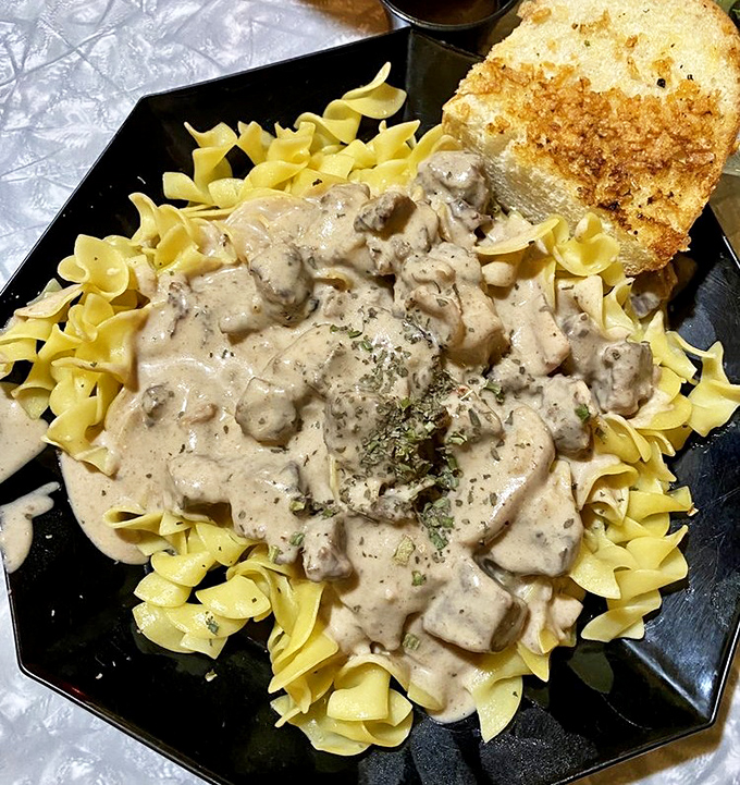 Beef stroganoff that doesn't mess around—tender chunks of beef swimming in creamy mushroom sauce over egg noodles. Comfort food that hugs you from the inside.