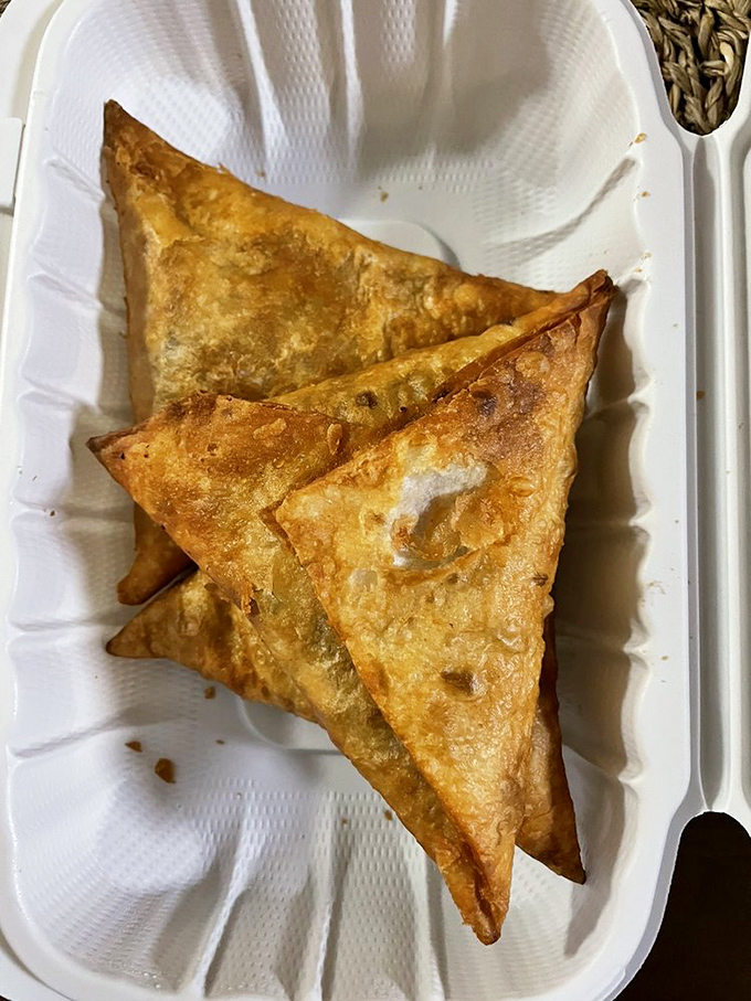 These triangular beef sambusas aren't just appetizers&mdash;they're edible treasure chests filled with spiced meat that puts ordinary samosas on notice.