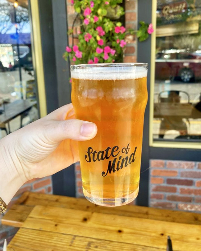 Golden beer in branded glassware&mdash;the universal signal that you've found your new favorite local spot. Resistance is futile. 