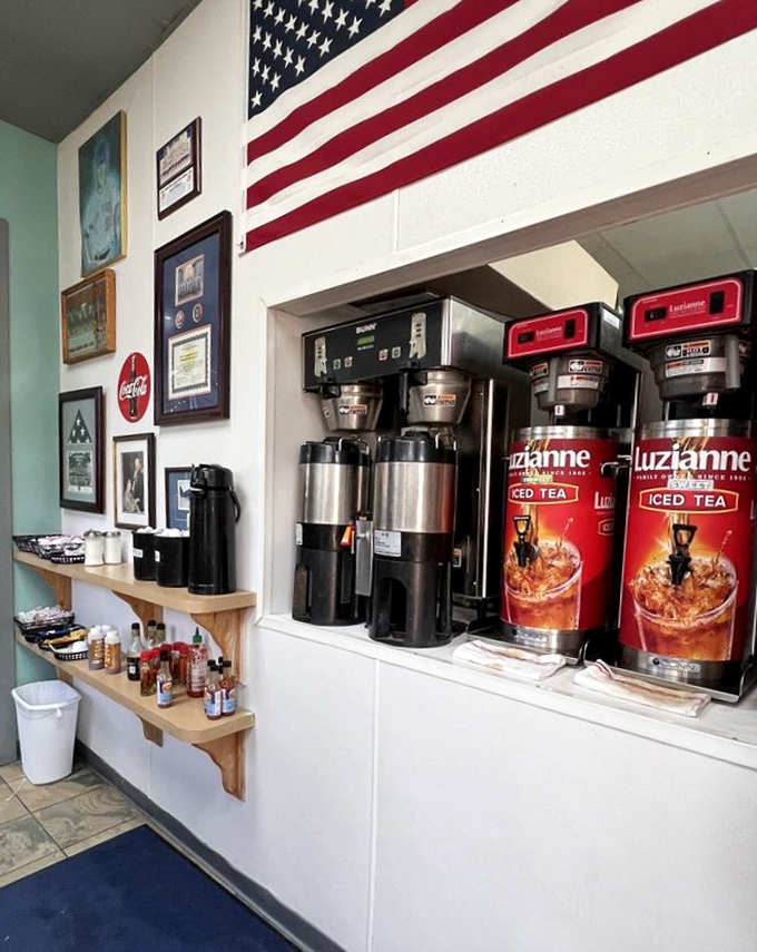 The beverage station stands ready under Old Glory. Because nothing complements an all-American burger like sweet tea flowing like liquid sunshine.