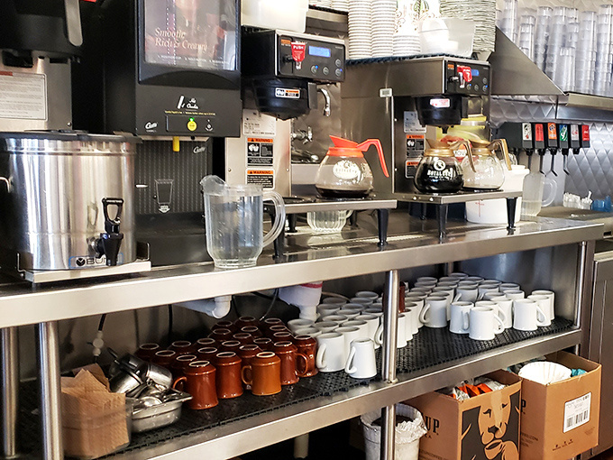 Coffee station ready for action&mdash;the unsung hero of the 24-hour diner. These machines have fueled more late-night conversations and early mornings than we can count.