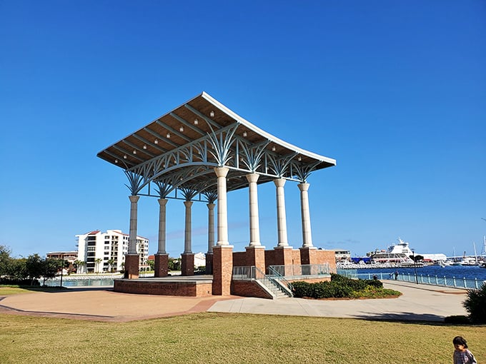 This waterfront pavilion provides shade for concerts and contemplation alike. Architecture that understands Florida's relationship with the sun.