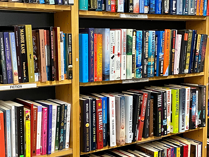 Book lovers' paradise with fiction shelves promising countless hours of literary escape and adventure.