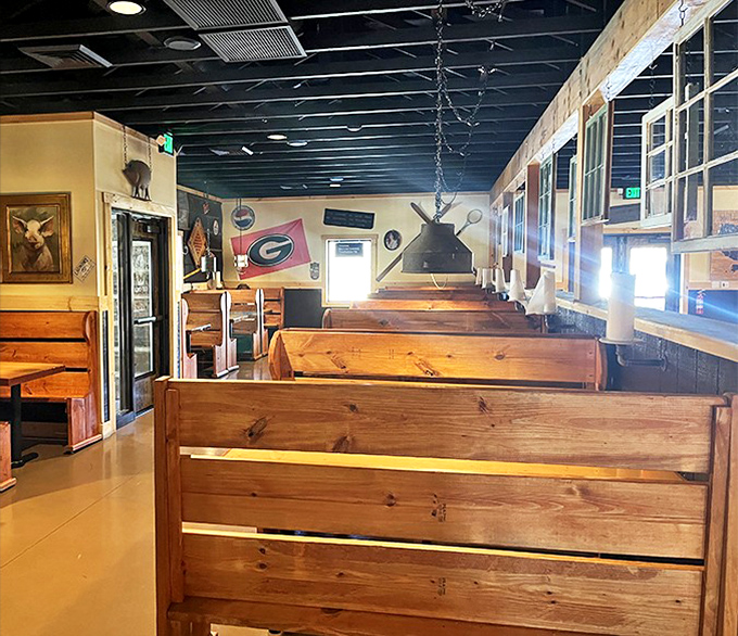 Church-like wooden booths where barbecue pilgrims come to worship at the altar of smoke, spice, and everything nice.