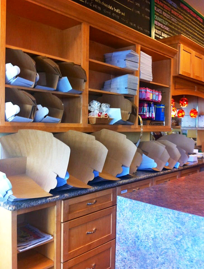 Neat stacks of bakery boxes waiting patiently to carry home your carefully chosen European delicacies.