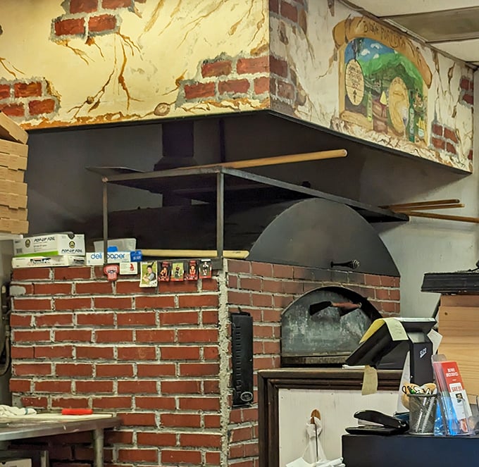 The brick oven isn't just equipment&mdash;it's the heart of the operation, turning dough into dreams at temperatures that would make the devil sweat.