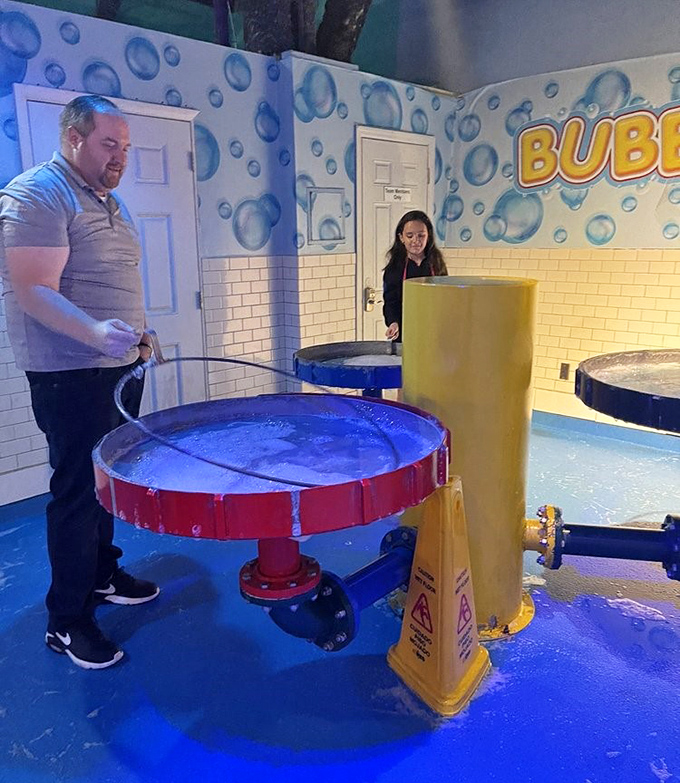 The Bubble Lab transforms simple soap and water into spheres of scientific wonder. Childhood joy meets physics in sudsy harmony.