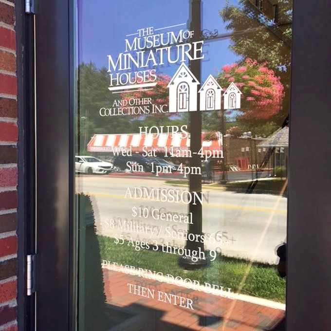 The museum's hours are posted for human-sized visitors. No word on when the tiny residents hold their midnight parties.