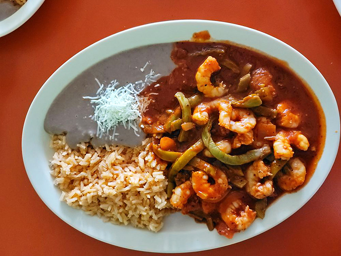 Camarones con nopales&mdash;where plump shrimp and cactus paddle strips swim in a sauce worth bottling and taking home to your pantry.