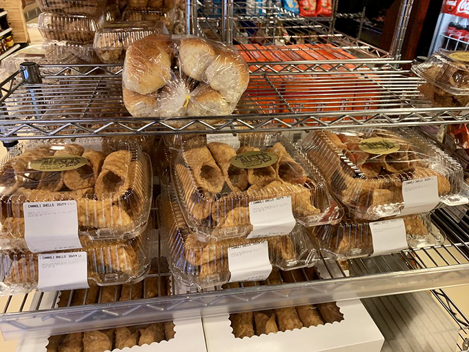 Cannoli shells waiting for their sweet filling destiny&mdash;crispy vehicles of joy lined up like delicious soldiers ready for dessert duty.