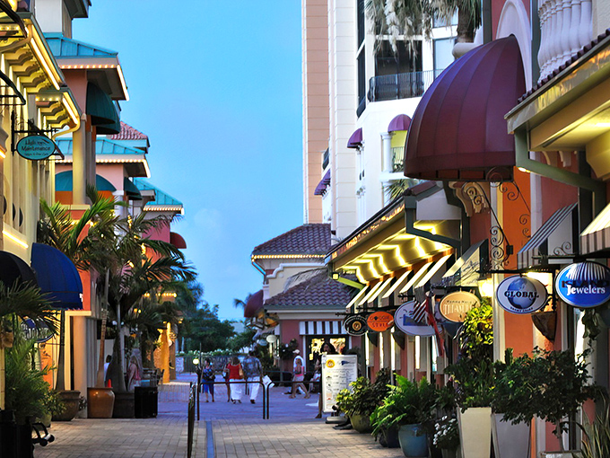 Cape Harbor's colorful storefronts create a tropical retail therapy session. Shopping becomes mandatory when buildings look this inviting.